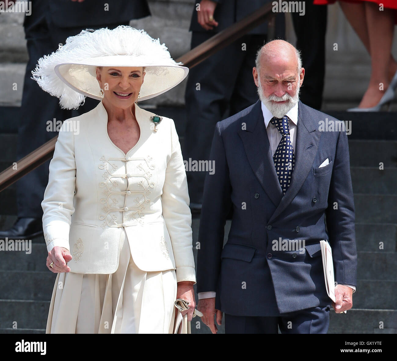 The Queen, accompanied by Prince Philip and other members of the Royal ...