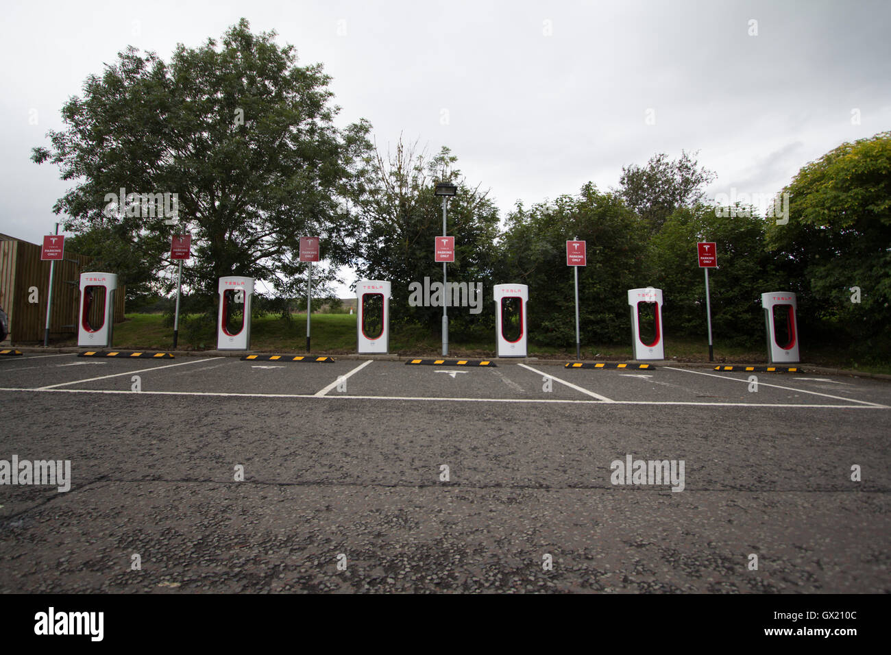 Empty Tesla car vehicle charging stations, England, UK Stock Photo - Alamy