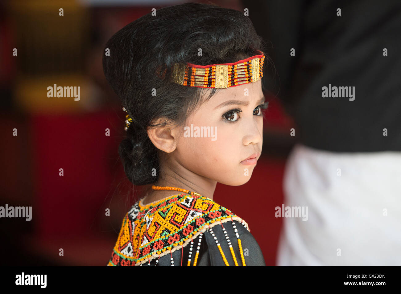 Unidentified portrait of young Torajan pose for camera with traditional ...