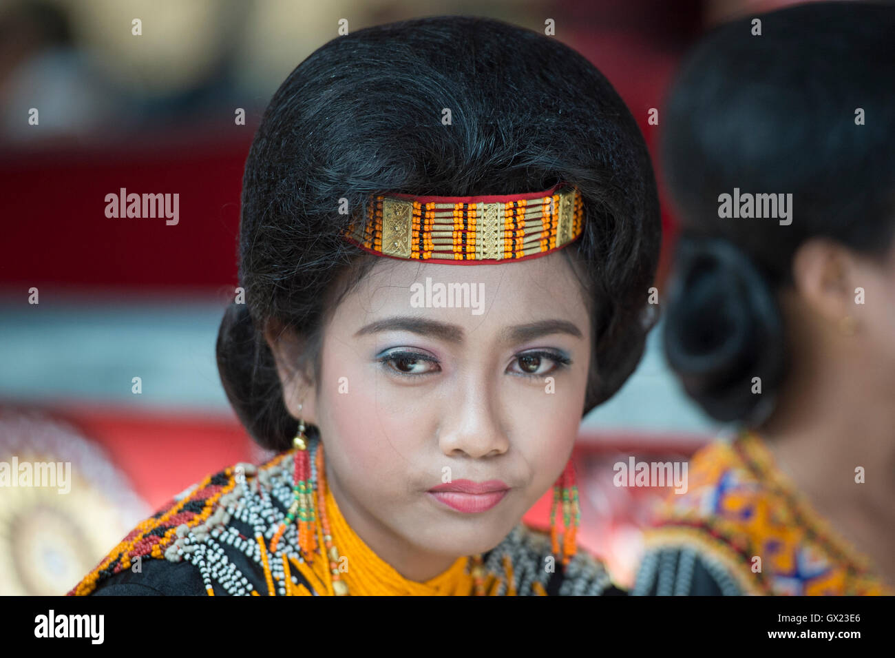 Unidentified portrait of young Torajan pose for camera with traditional ...