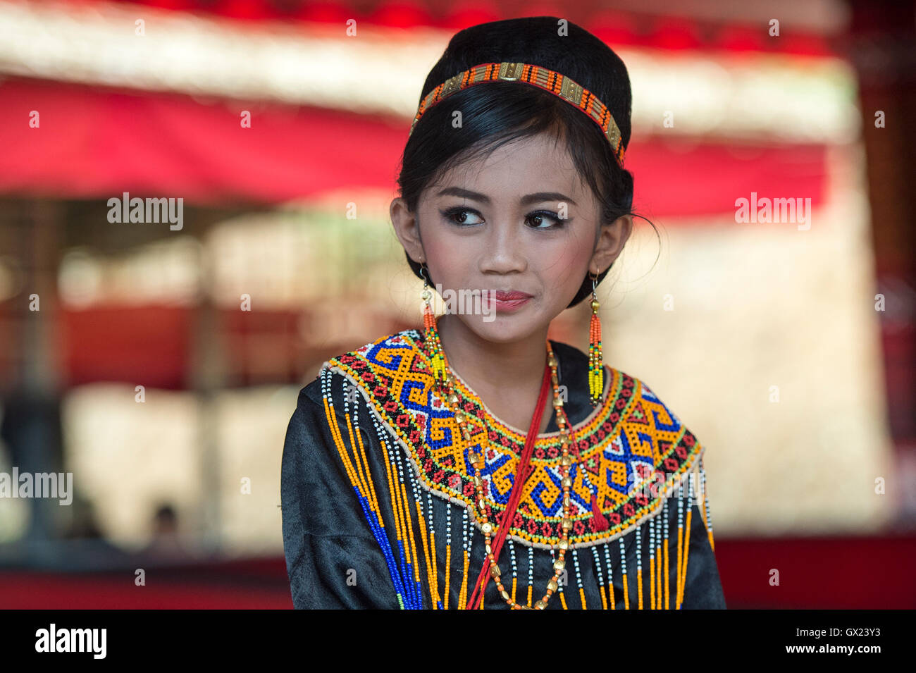 Sweet smile of unidentified portrait of young Torajan pose for camera ...