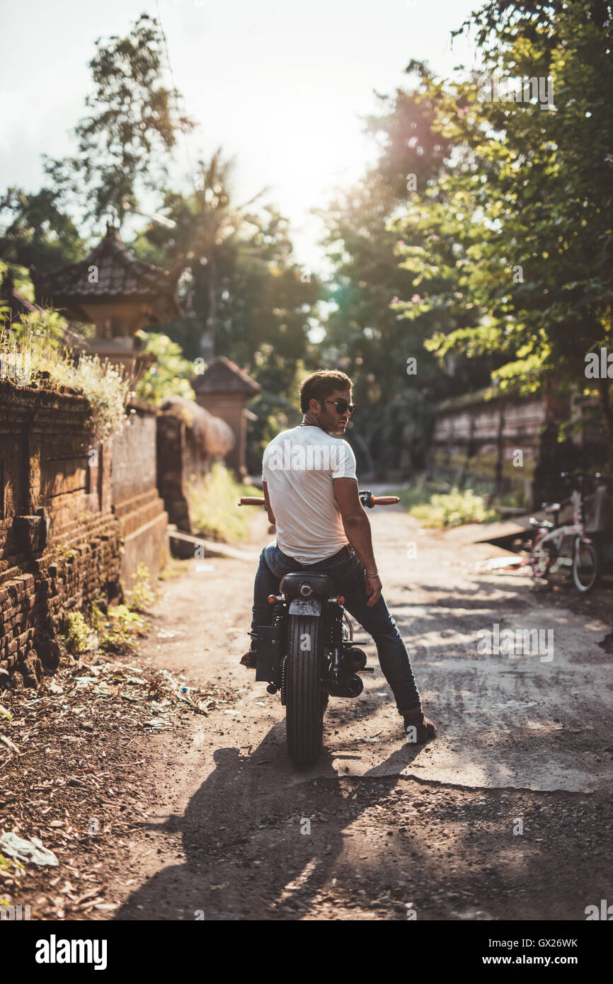 Person sitting on motorcycle hi-res stock photography and images - Alamy