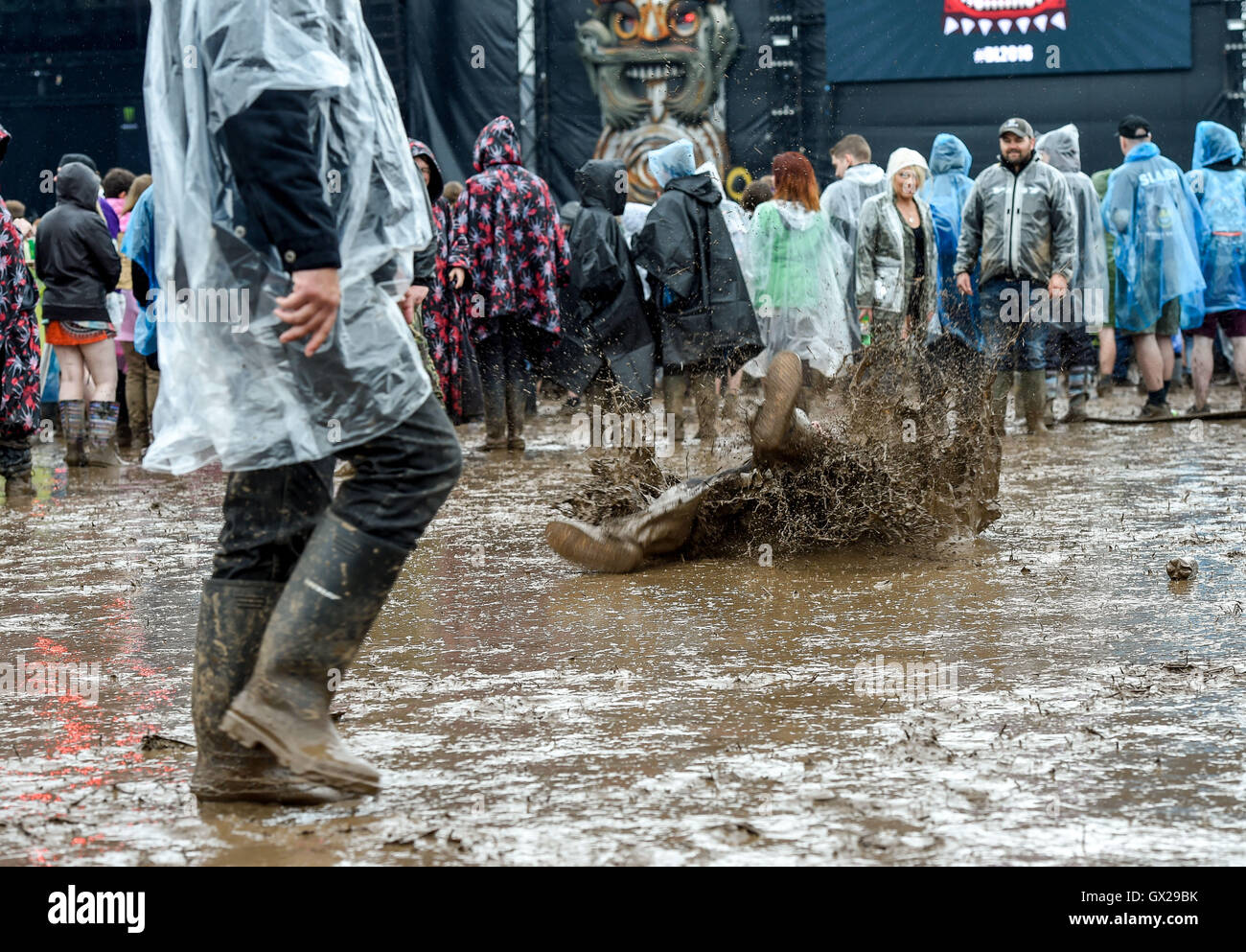 Download Festival revellers in the mud Featuring: Atmosphere Where ...