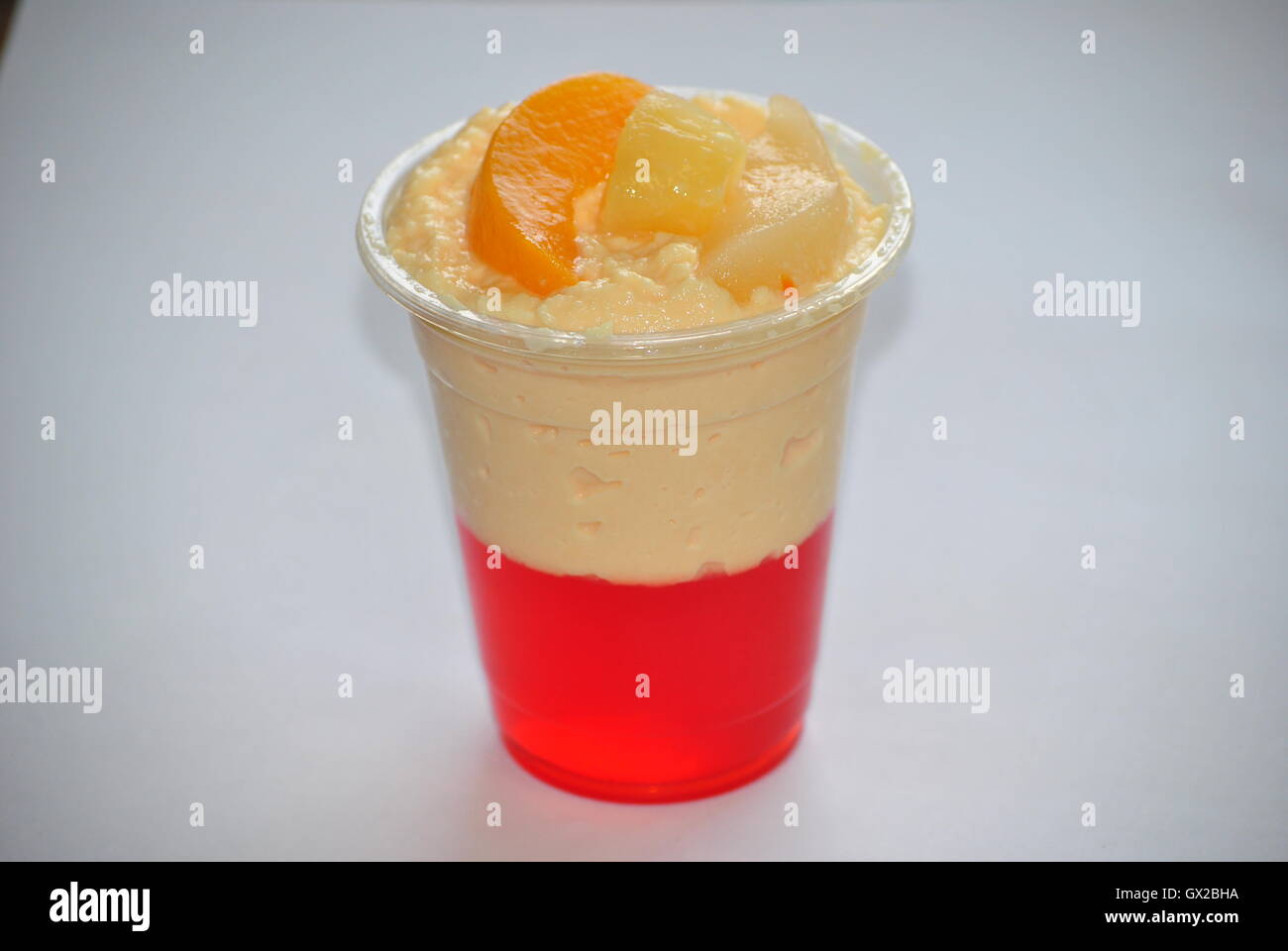 custard and jelly dessert in plastic glass Stock Photo - Alamy