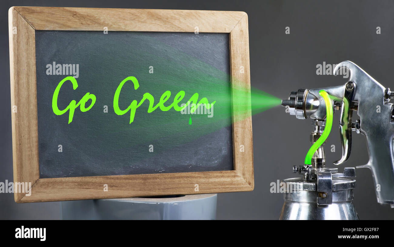 Go Green painted on new sign board Stock Photo - Alamy