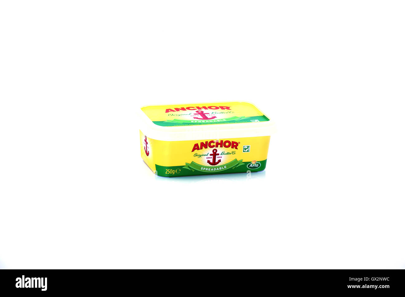 Plastic container of Anchor butter on a white background Stock Photo ...