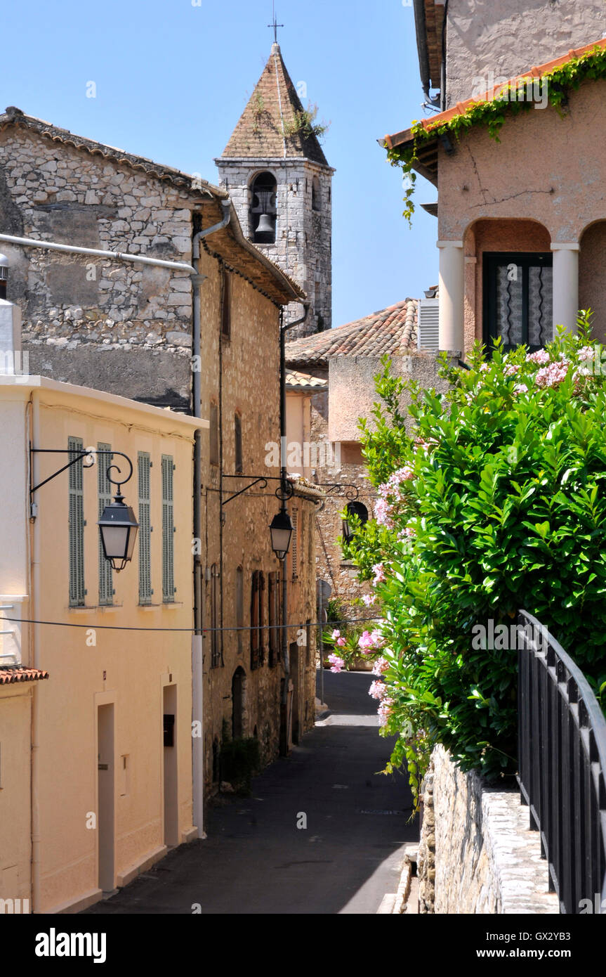Street and church of village Tourrettes-sur-Loup in southeastern France ...