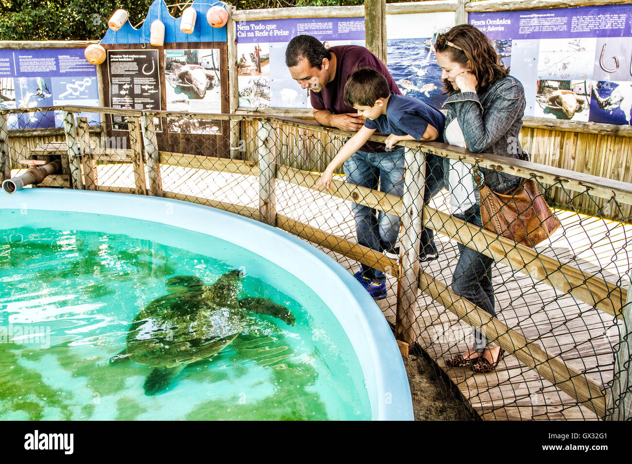 Family visiting Tamar Turtle Protection Project (Projeto Tamar), at ...
