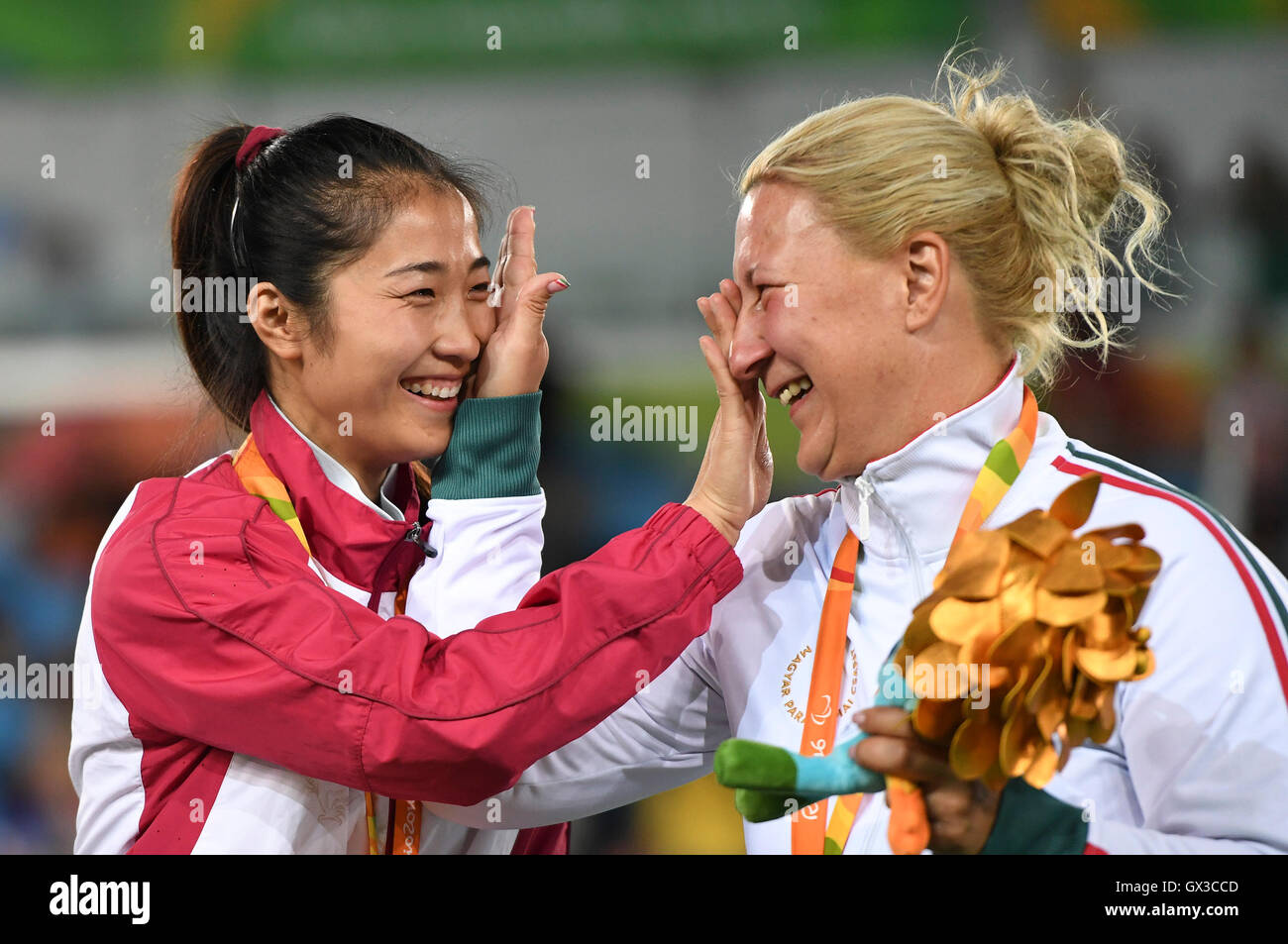 Rio De Janeiro, Brazil. 14th Sep, 2016. Gold medalist Rong Jing (L) of ...