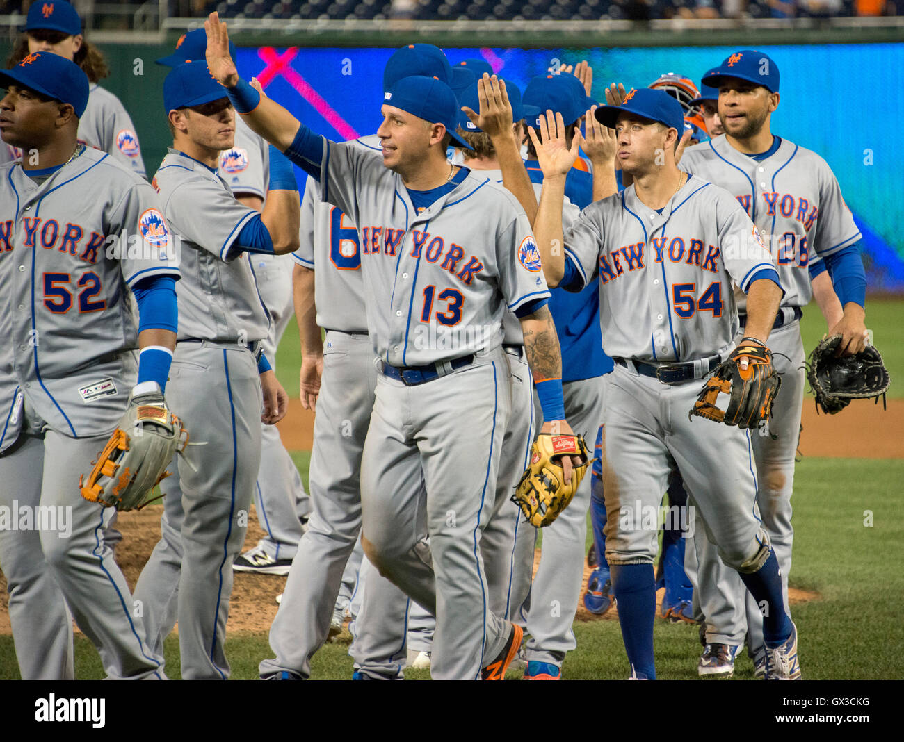 New York Mets third baseman T.J. Rivera (54), who hit the game-winning ...