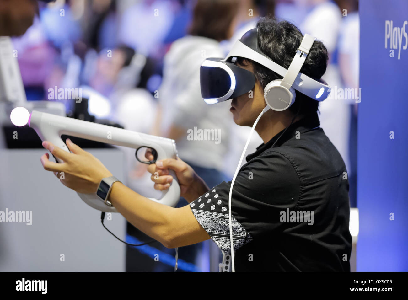 Tokyo, Japan. 15th September, 2016. A visitor tries out Play Station VR ...
