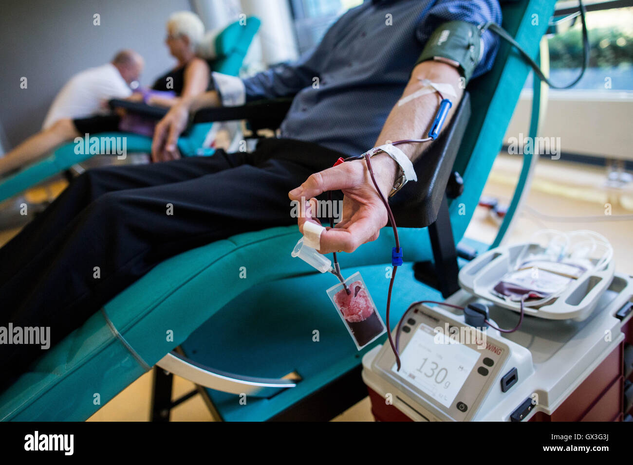 Ratingen, Germany. 15th Sep, 2016. A man donates blood at the blood ...