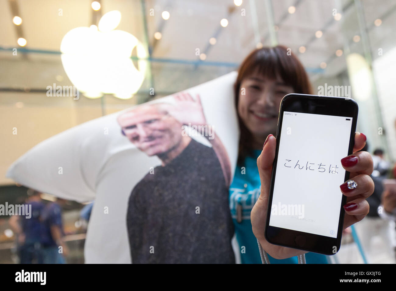 Tokyo, Japan. 16th September, 2016. A satisfied buyer shows her new ...