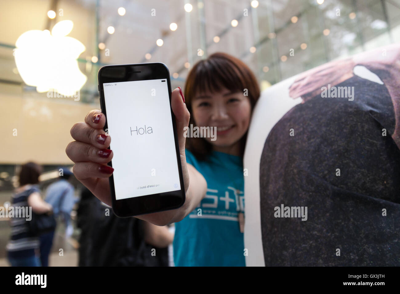 Tokyo, Japan. 16th September, 2016. A satisfied buyer shows her new ...
