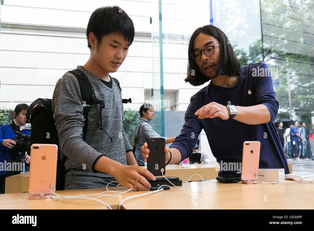 Tokyo, Japan. 16th September, 2016. A staff member introduces the new ...