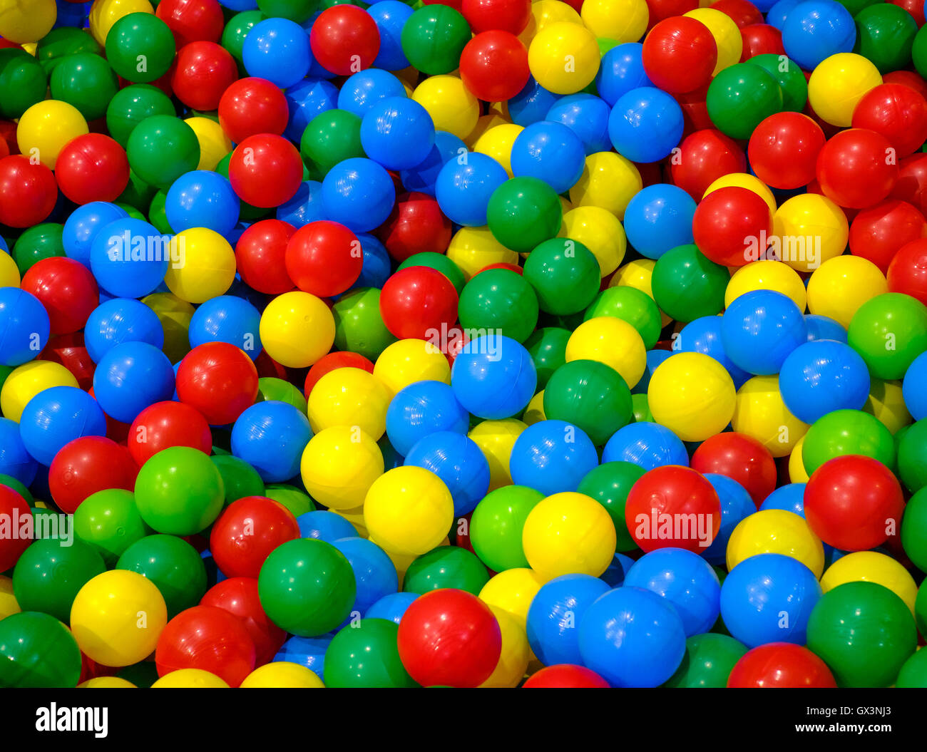 Plastic balls in playroom Stock Photo - Alamy