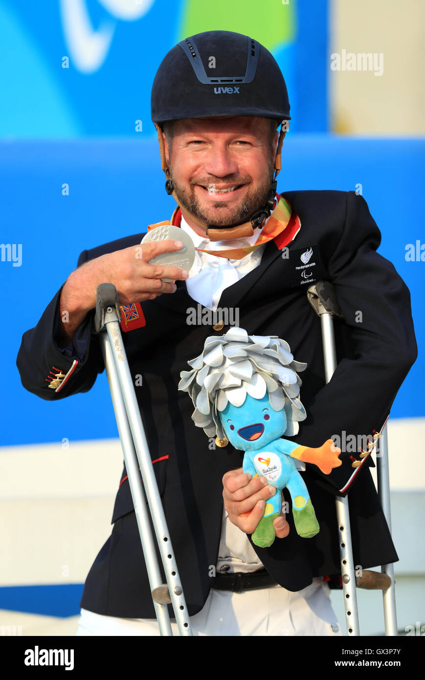 Great Britain's Lee Pearson celebrates on the podium after winning a ...
