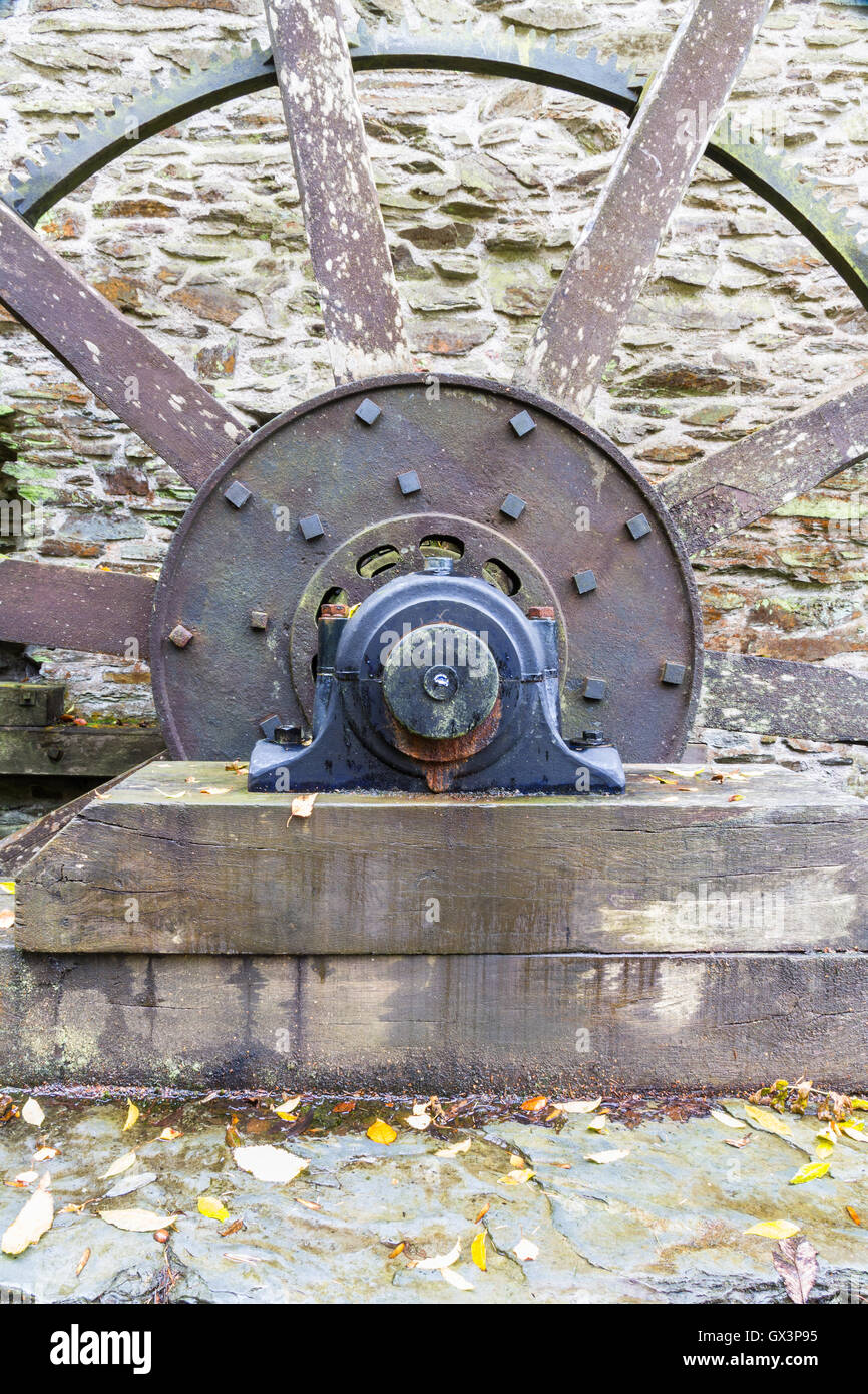 Axle of old water wheel with spokes projecting from it Stock Photo - Alamy