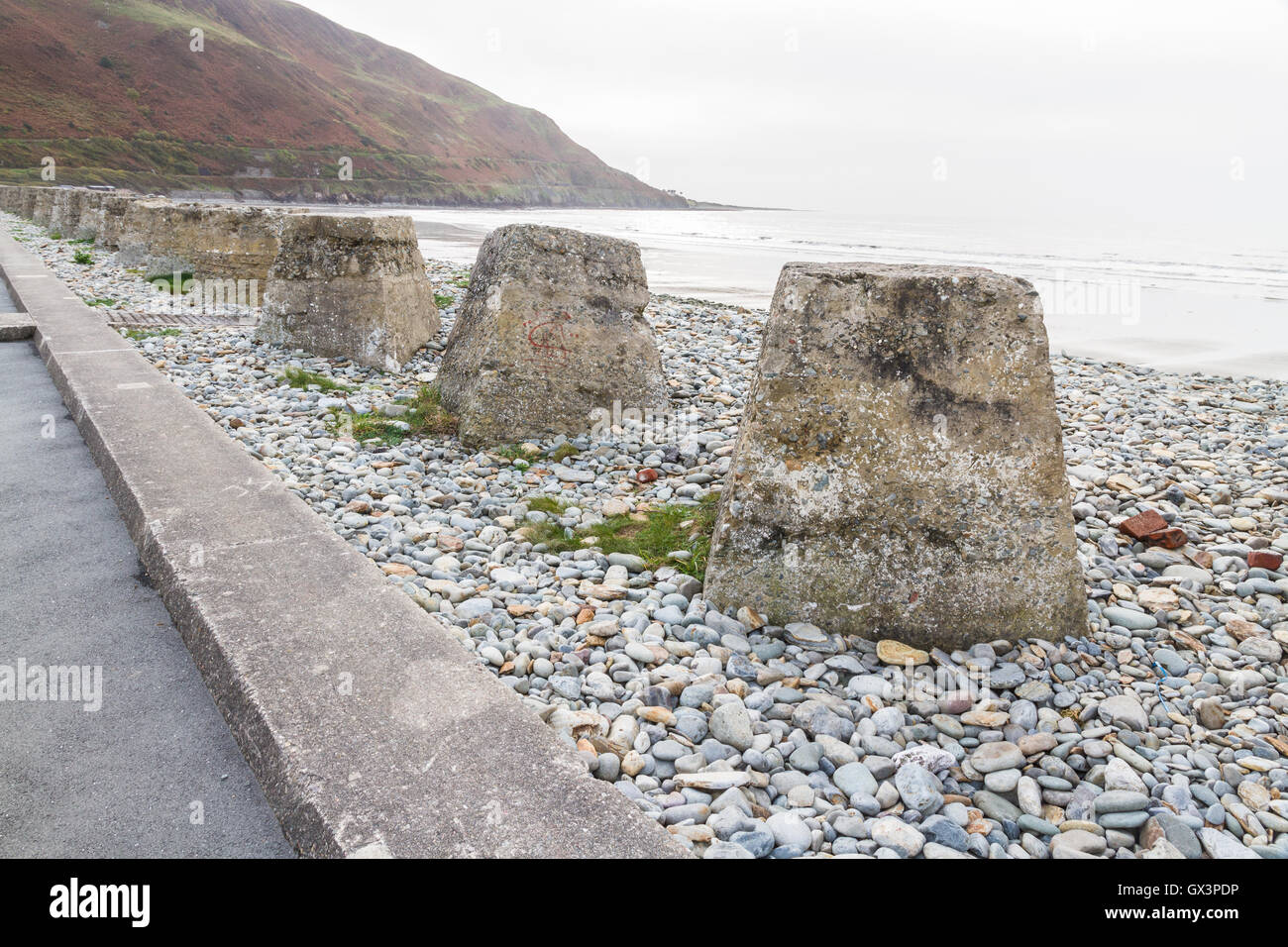 Anti-tank cubes from World War II to prevent invasion. Fairbourne beach ...