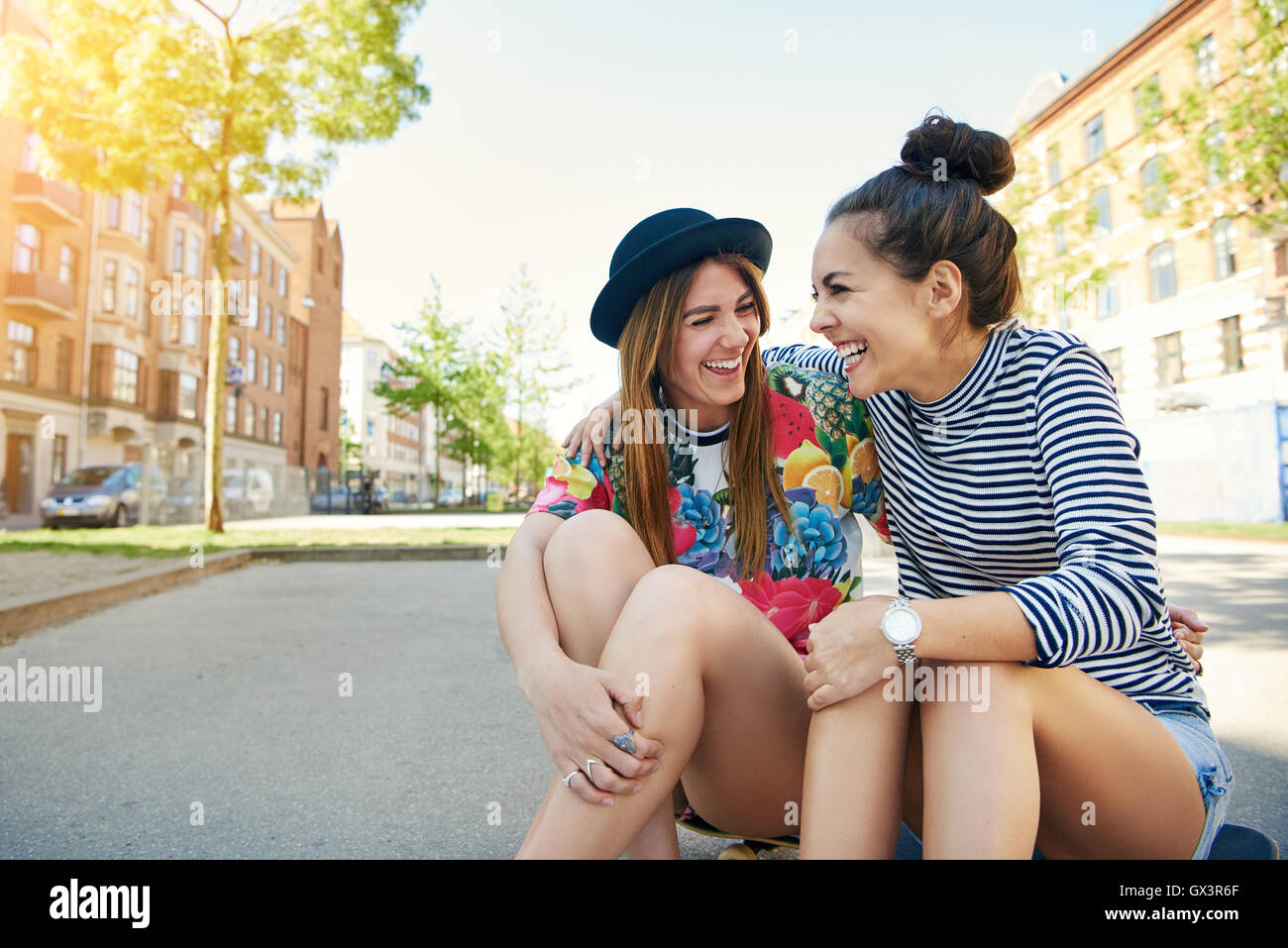 Two women laughing high key hi-res stock photography and images - Alamy