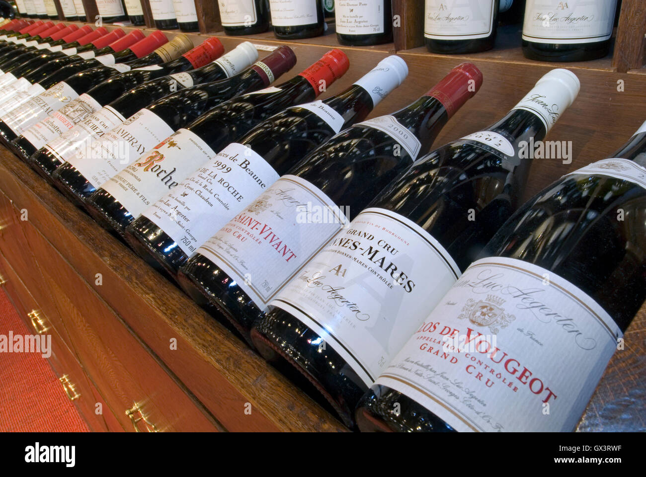Variety of fine Burgundy wine bottles on display for sale at Jean-Luc ...