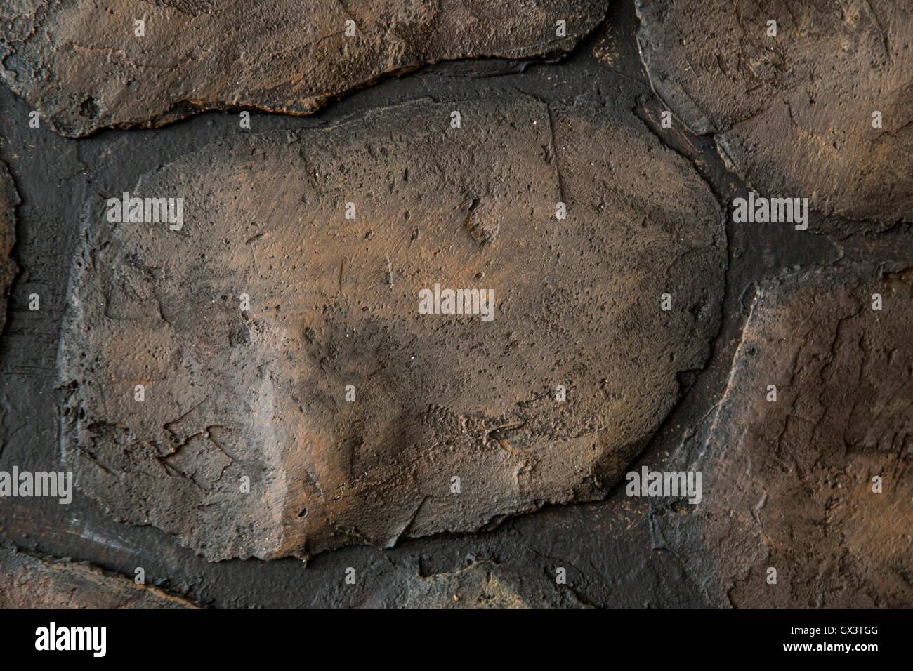Wall round stone rock texture Stock Photo - Alamy
