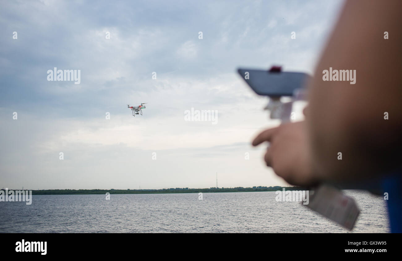 Flying drone over water hi-res stock photography and images - Alamy