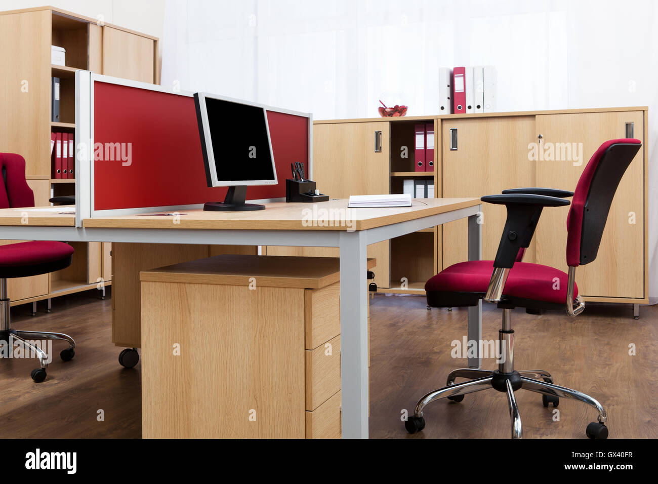 monitor on a desk in a modern office Stock Photo - Alamy
