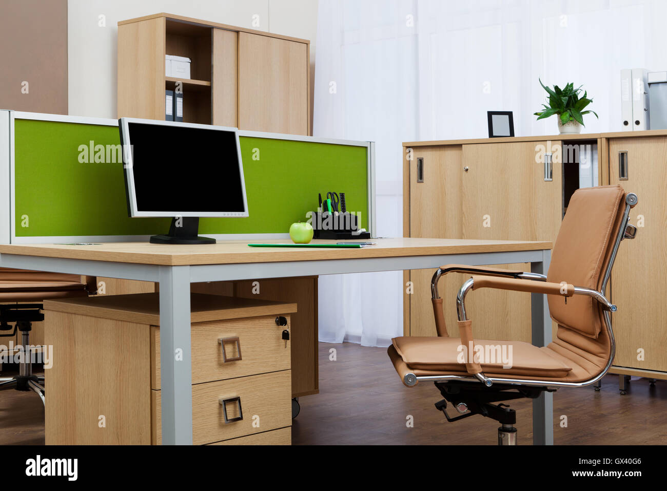 monitor on a desk in a modern office Stock Photo - Alamy