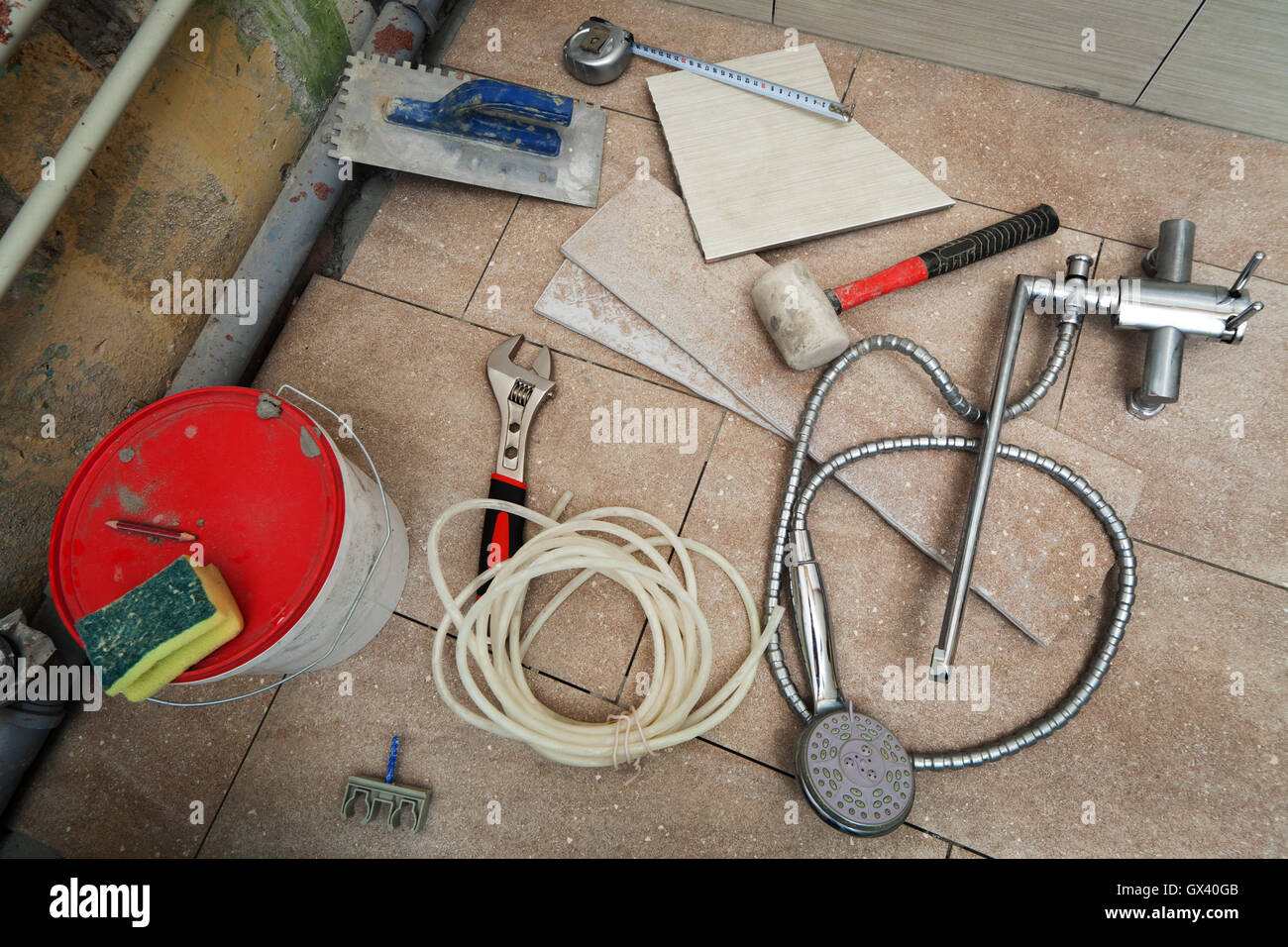 different tools for renovation in the bathroom Stock Photo - Alamy