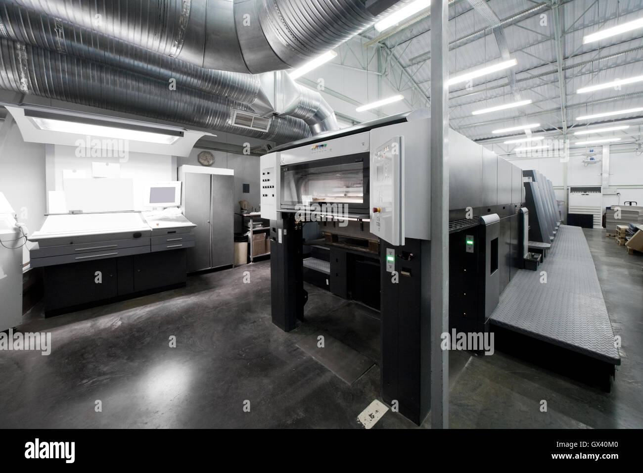 The equipment for printing in a modern printing house Stock Photo - Alamy