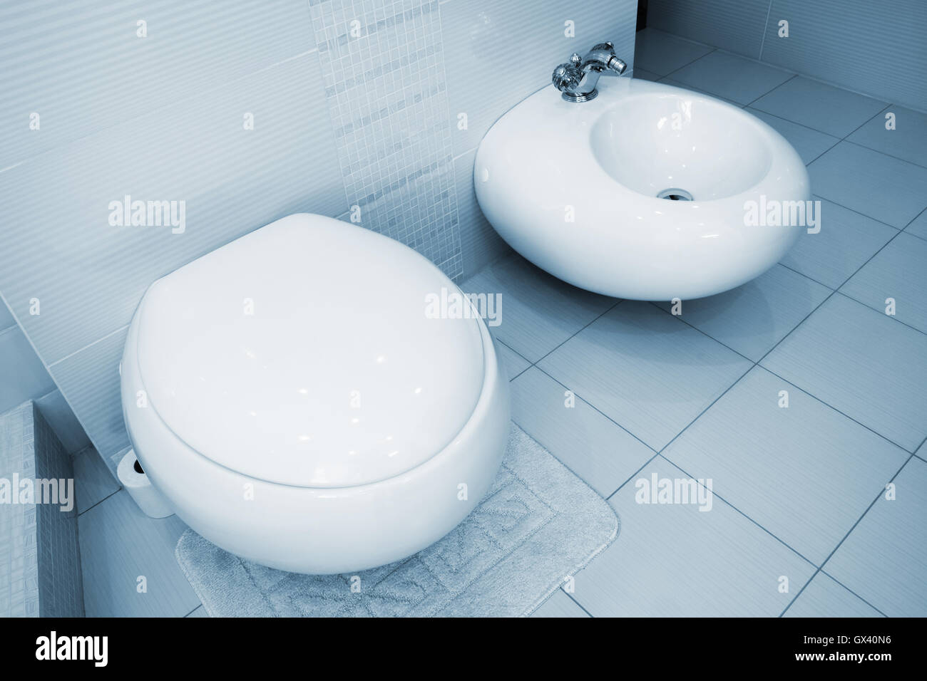 WC and bidet in a beautiful pink bathroom Stock Photo - Alamy