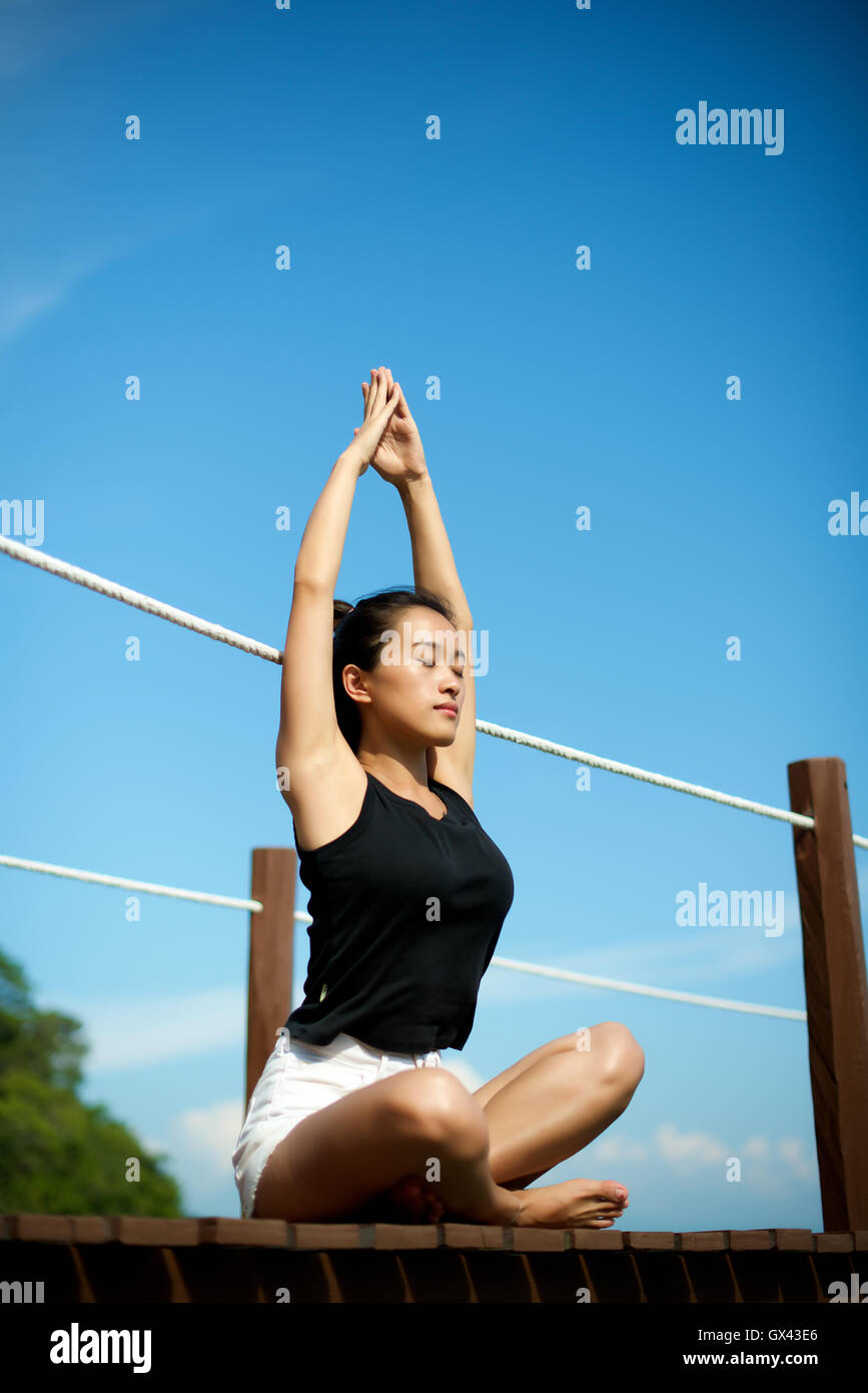 Chinese girl doing yoga hi-res stock photography and images - Alamy