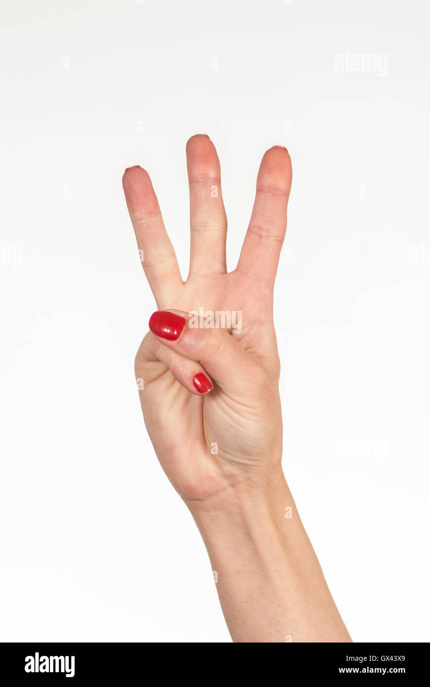 Woman's hand counting three Stock Photo - Alamy