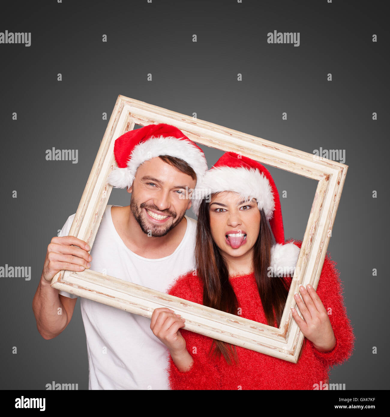 Couple looking through frame hi-res stock photography and images - Alamy