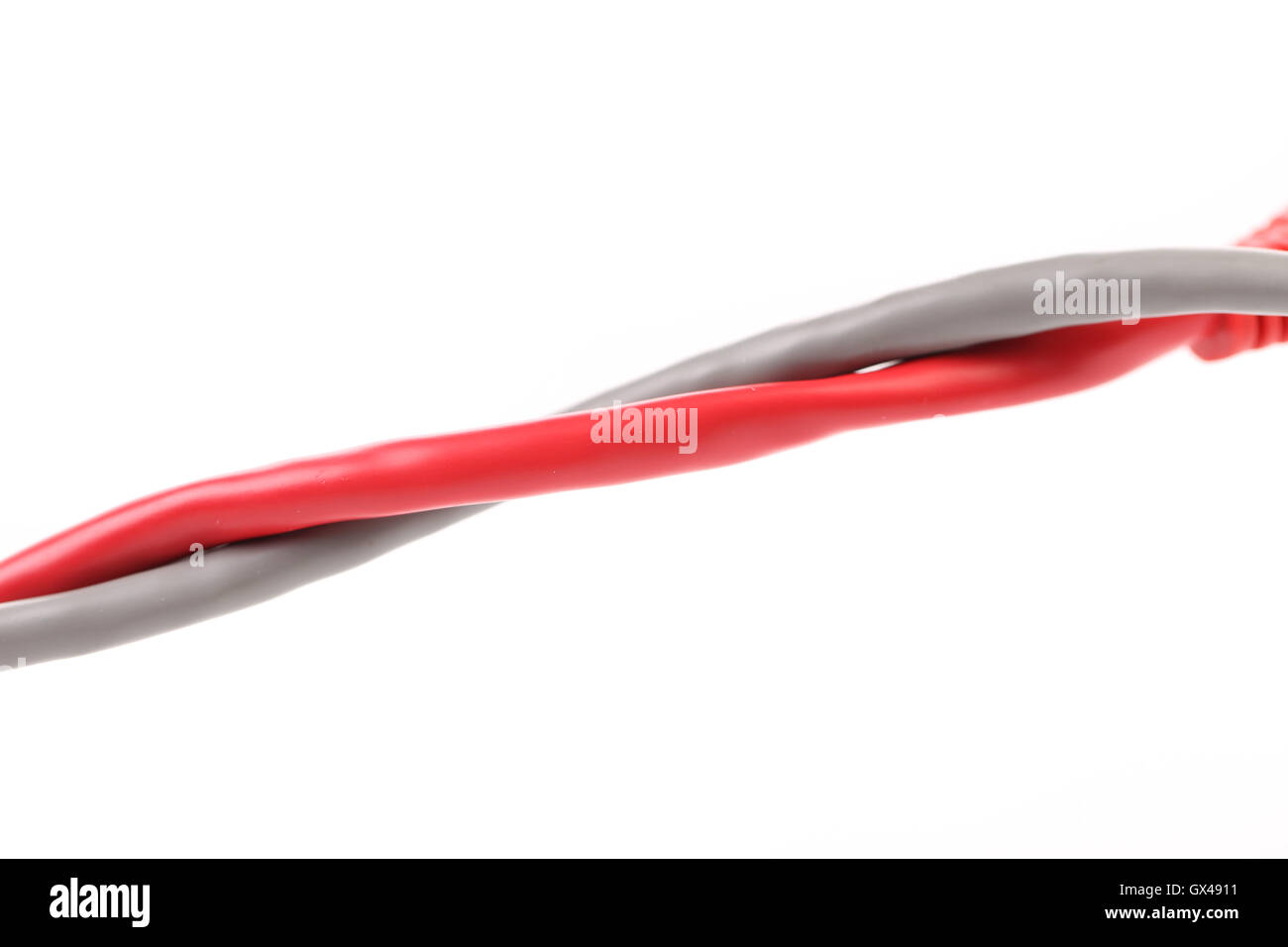Intertwined wires on a white background Stock Photo - Alamy