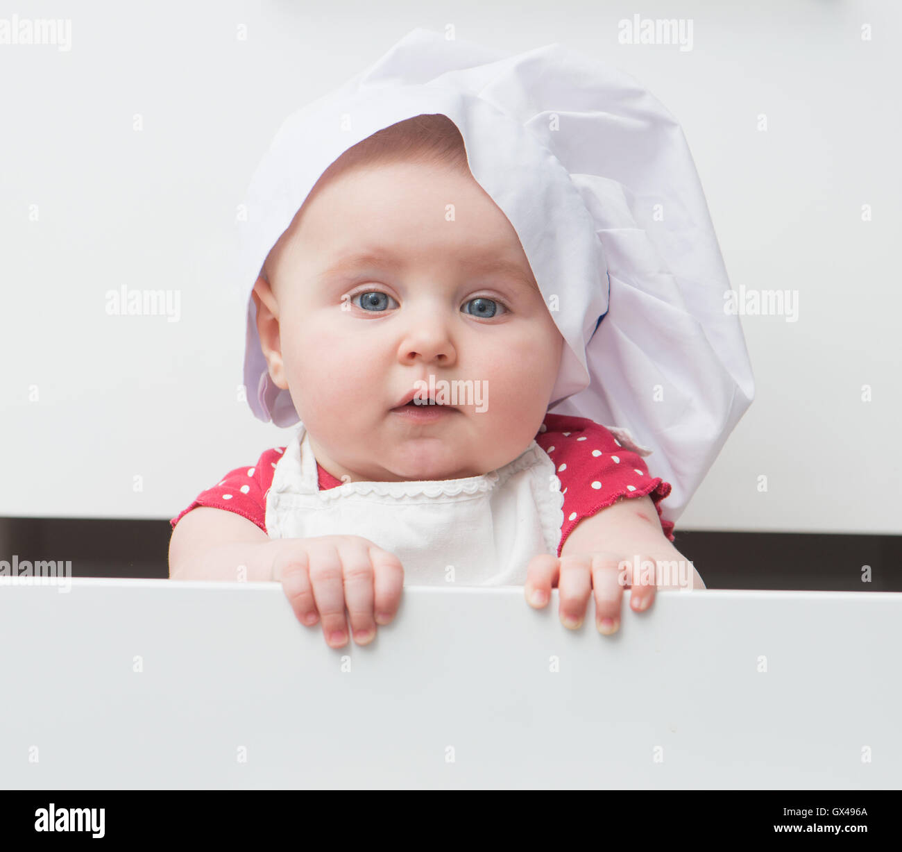 little baby in a chef's hat Stock Photo - Alamy