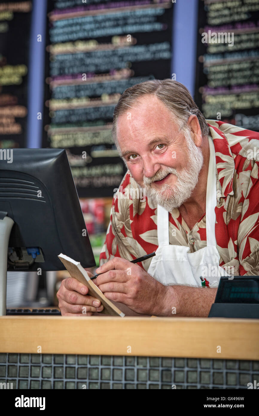 Smiling Cafe Worker Stock Photo - Alamy
