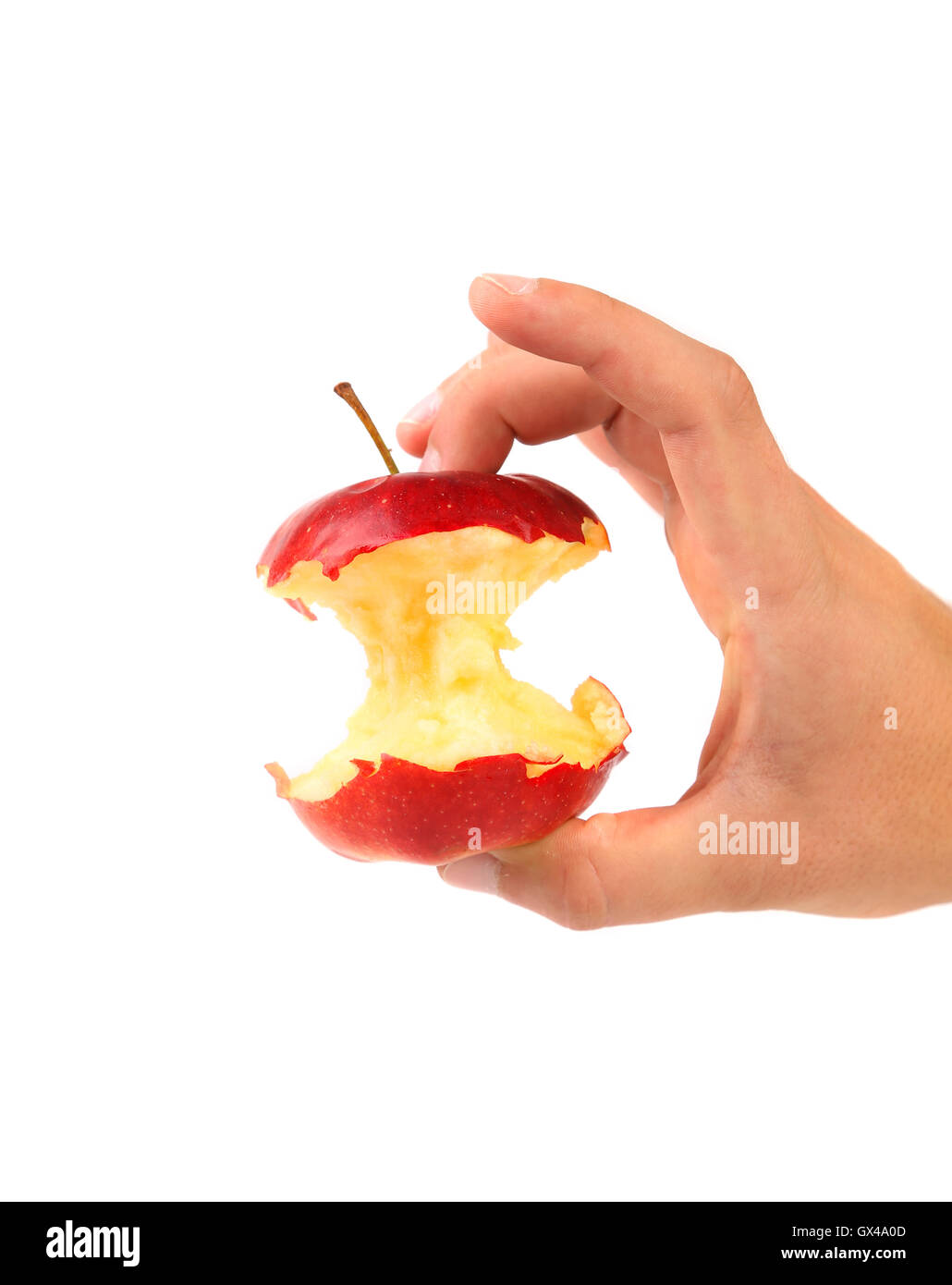 Hand holds core of an apple Stock Photo - Alamy