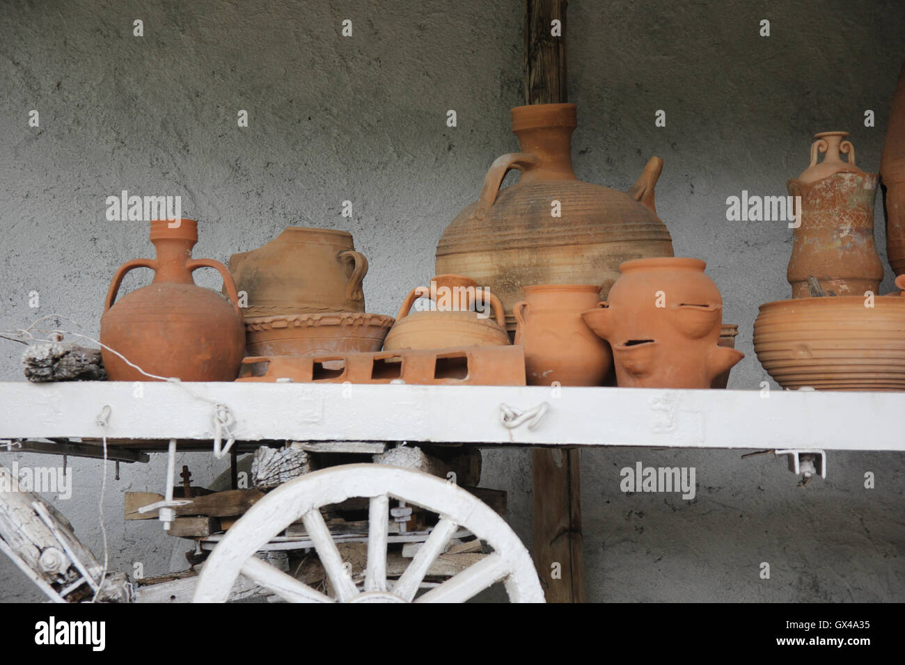 vintage cart with pottery Stock Photo - Alamy