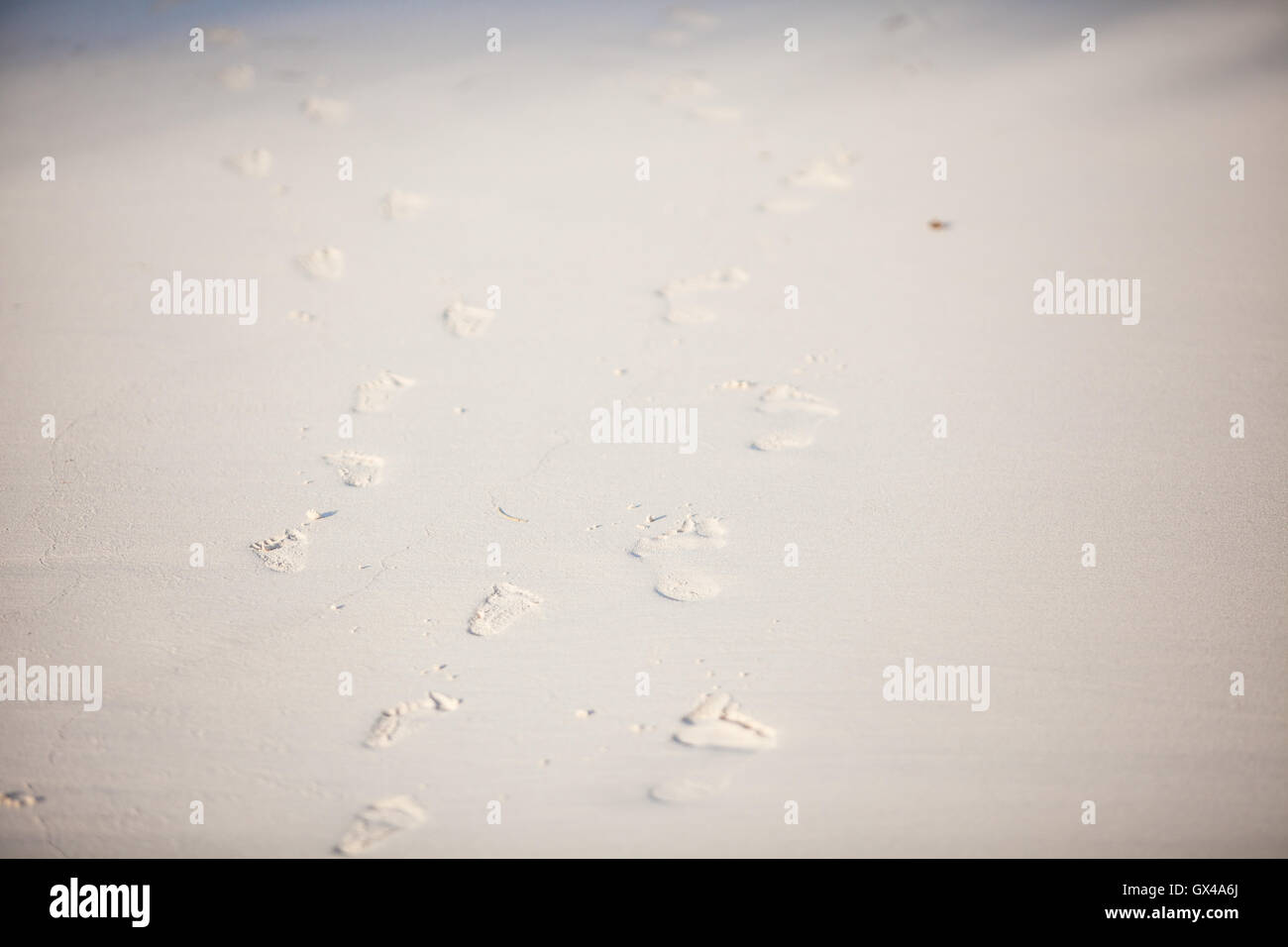 Human footprints on white sandy hi-res stock photography and images - Alamy