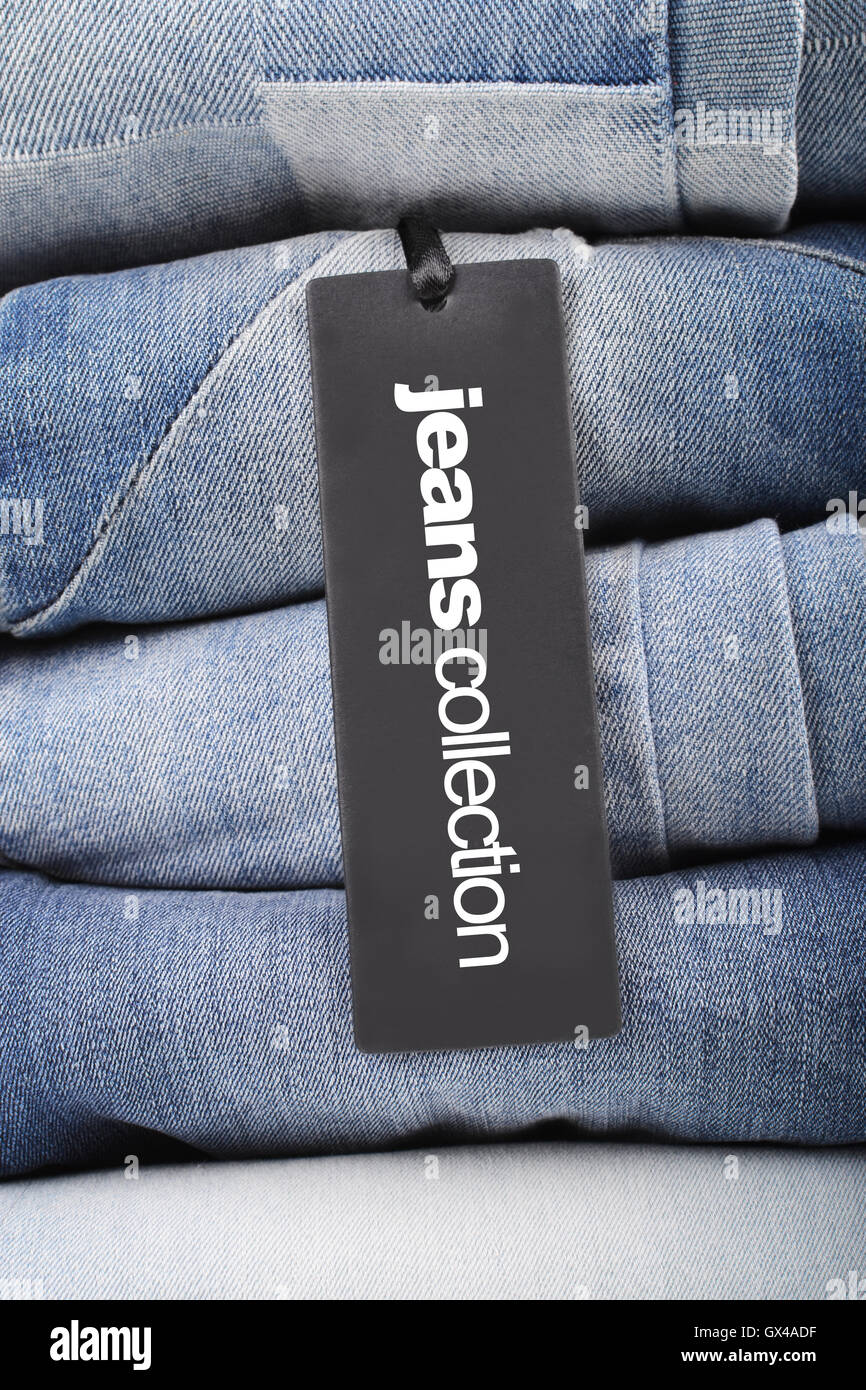 Stack folded jeans tag hi-res stock photography and images - Alamy