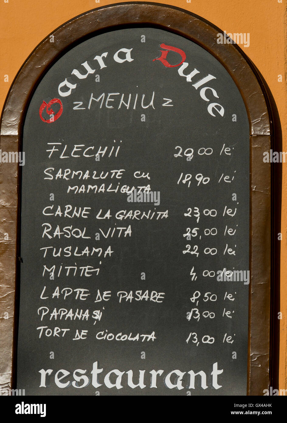 Traditional Romanian restaurant menu in the medieval city of Brasov in ...