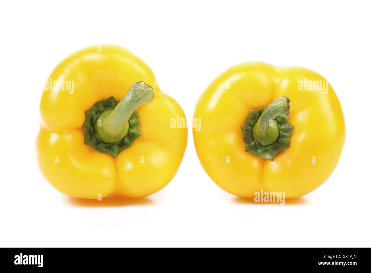 Yellow peppers isolated Stock Photo - Alamy