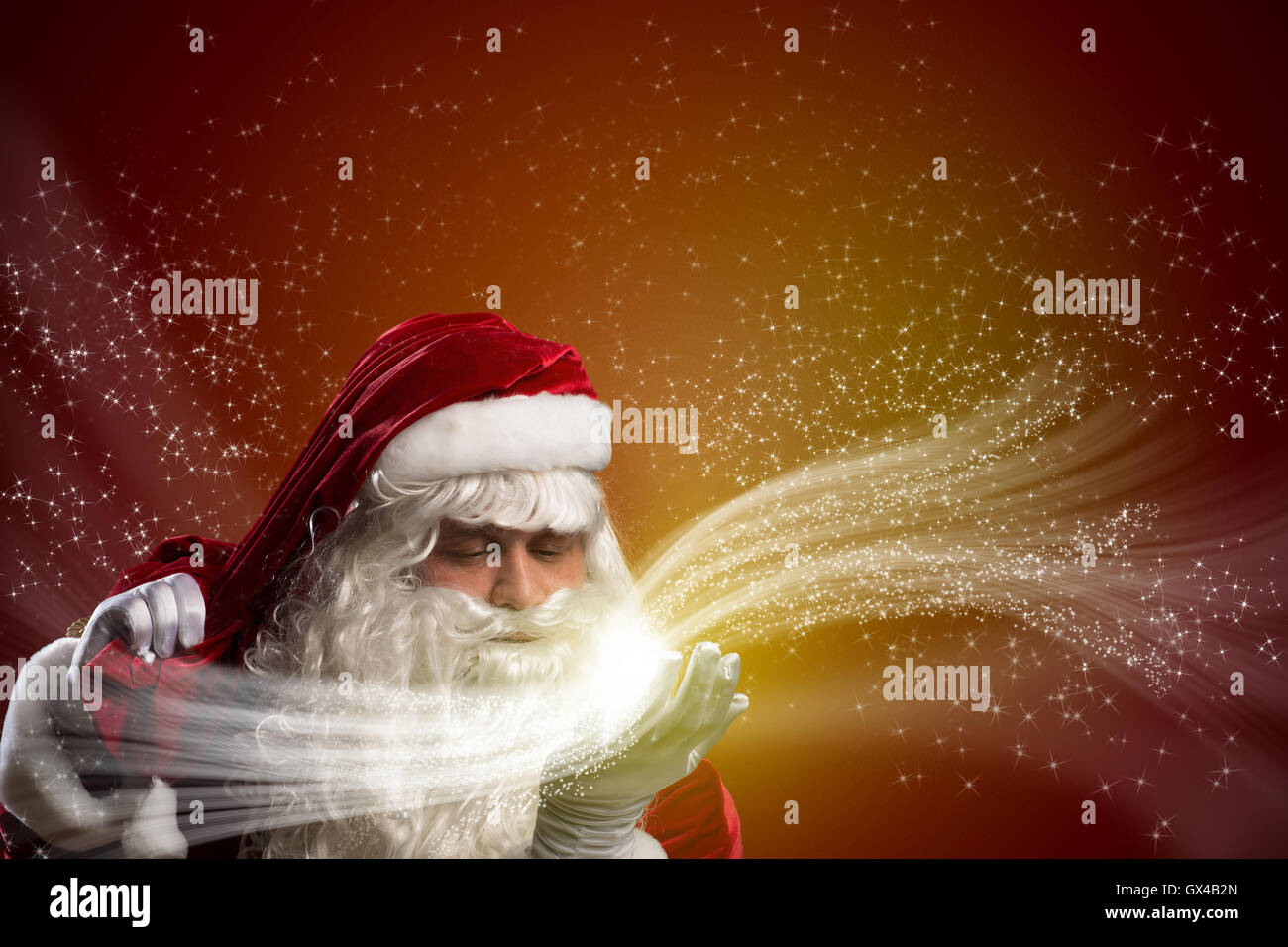 Santa Claus and the magic Stock Photo - Alamy