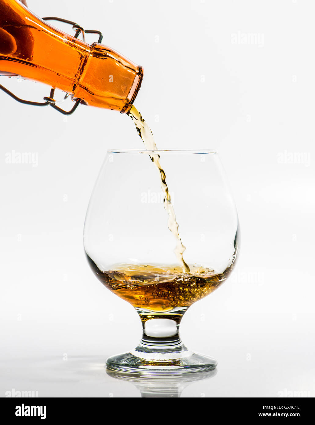 Pouring a glass Stock Photo - Alamy