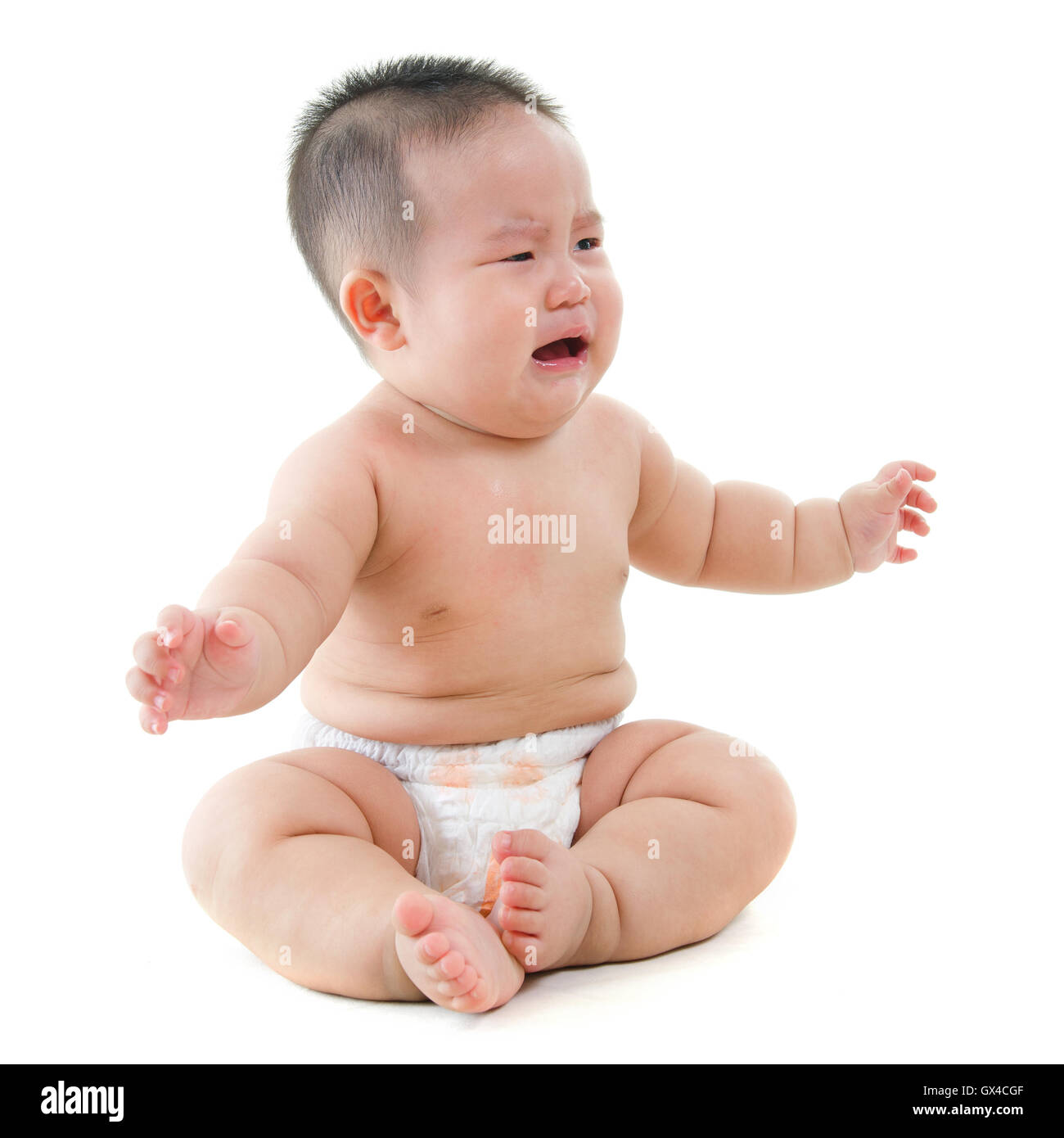 Crying Asian baby boy requests for food Stock Photo - Alamy