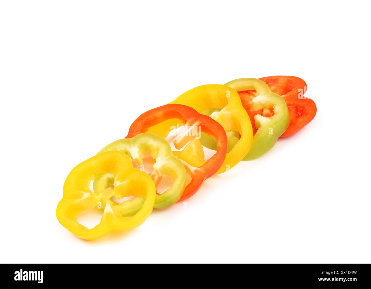 Sliced peppers isolated on white Stock Photo - Alamy