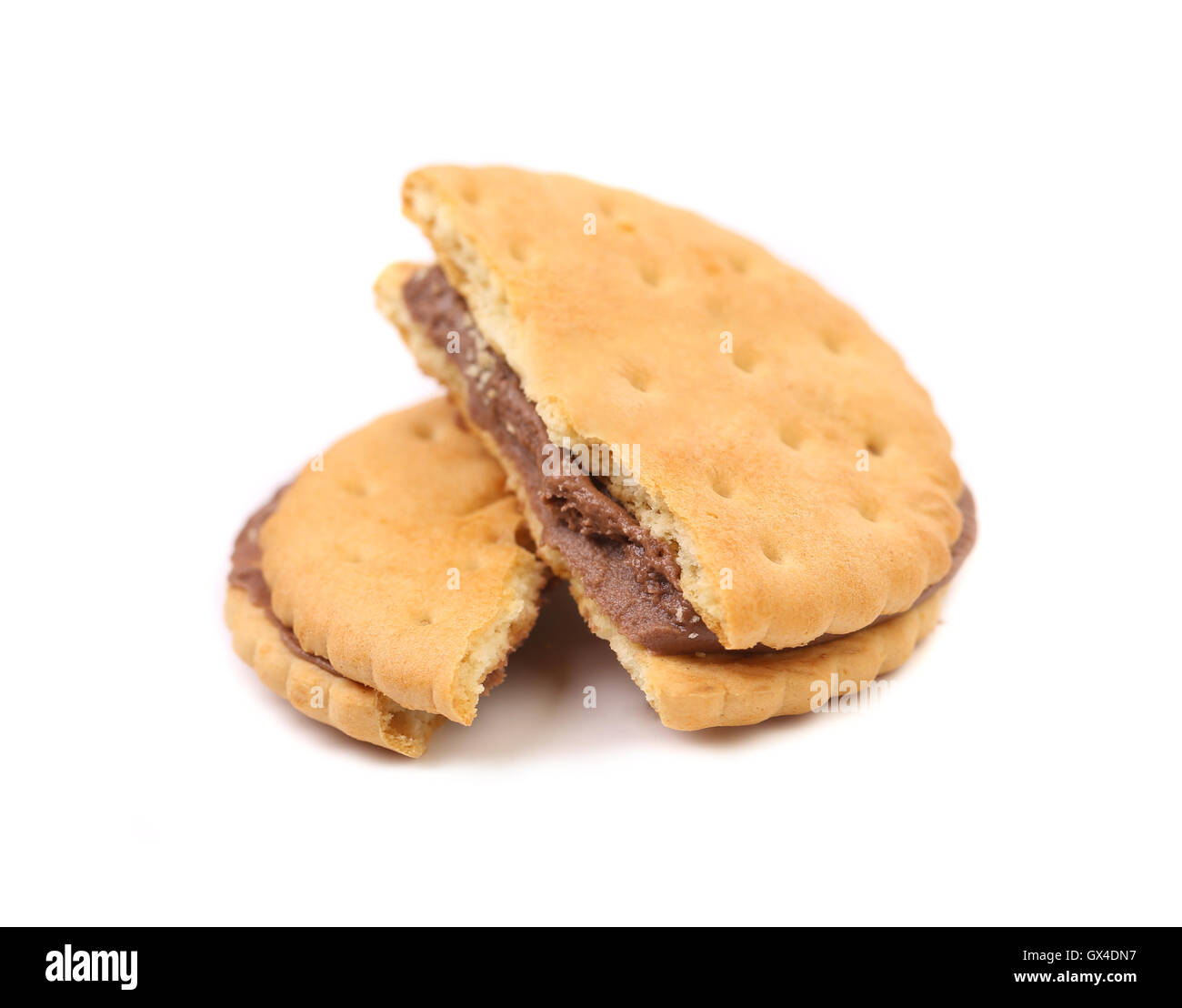 Broken sandwich biscuits with chocolate filling Stock Photo - Alamy