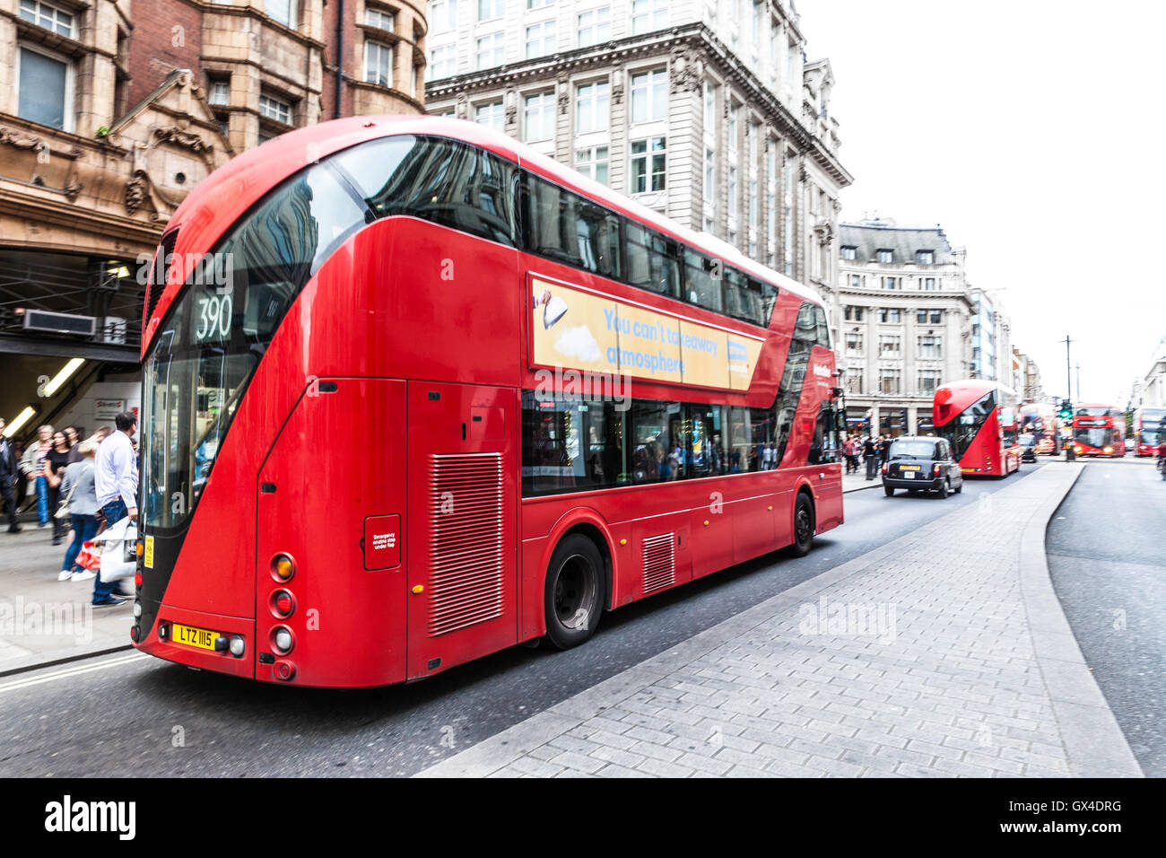 Rear view of a double decker bus traveling along Oxford Street, London ...
